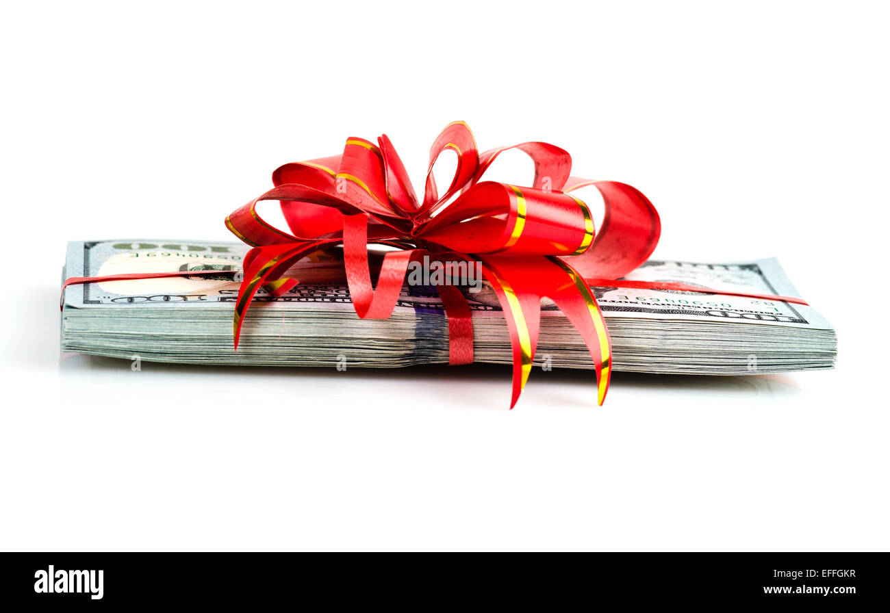 Money gift, big stack of dollars with red bow isolated on white ...