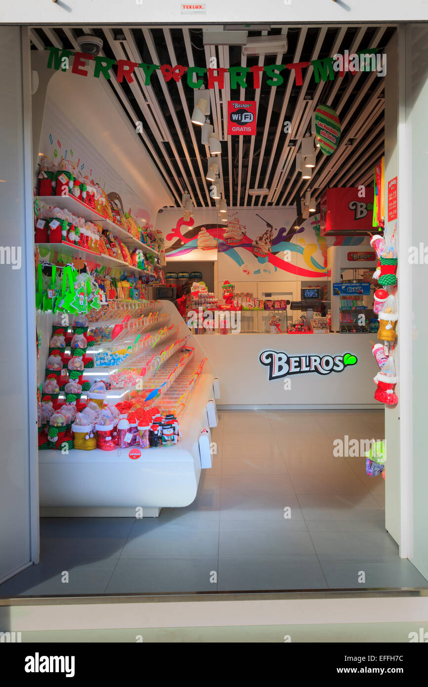 Inside a colourful unoccupied sweet shop in Spain Stock Photo - Alamy