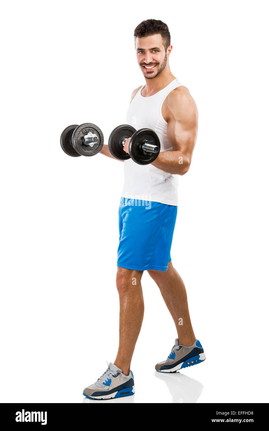 Portrait of a muscular man lifting weights, isolated over a white ...