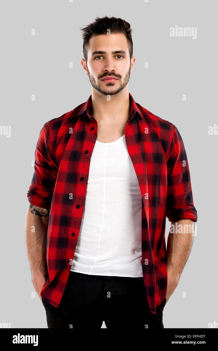 Studio portrait of a handsome young man Stock Photo - Alamy
