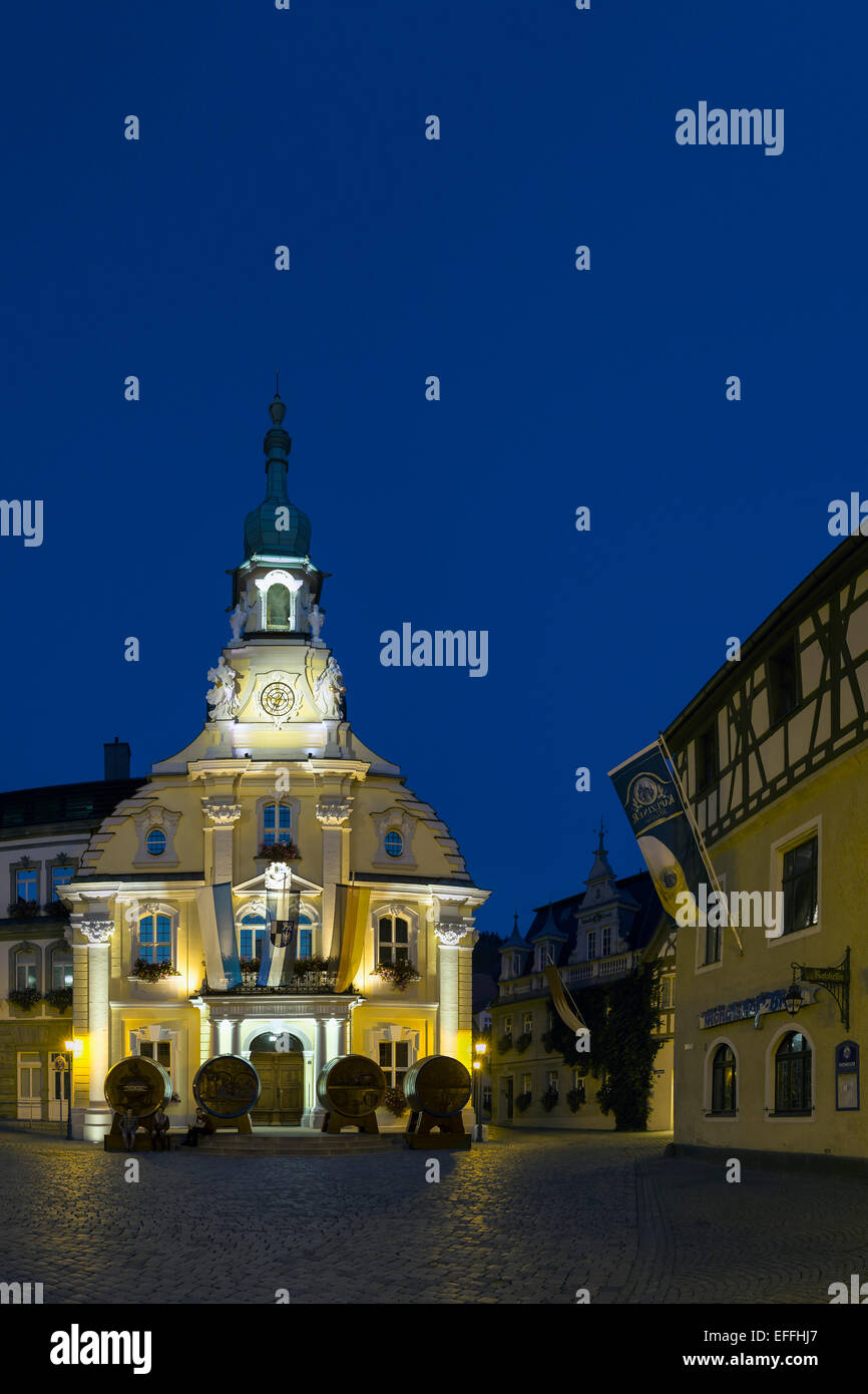 Germany, Bavaria, Kulmbach, Rococo town hall with beer barrels in front ...
