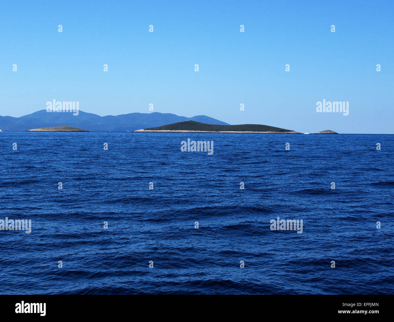 View at mediterranean islands and clean blue sea Stock Photo - Alamy