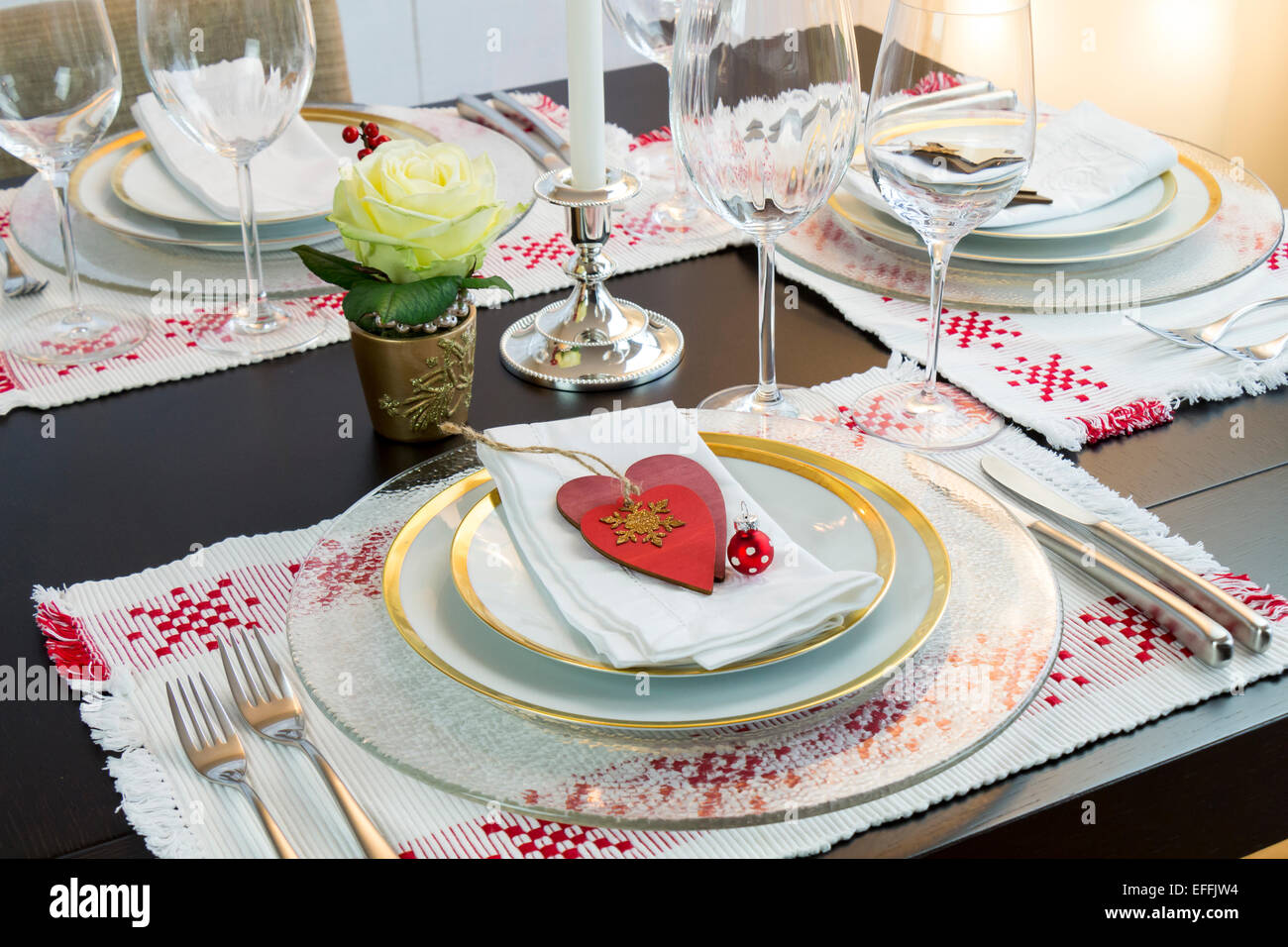 Festive laid dinner table Stock Photo - Alamy