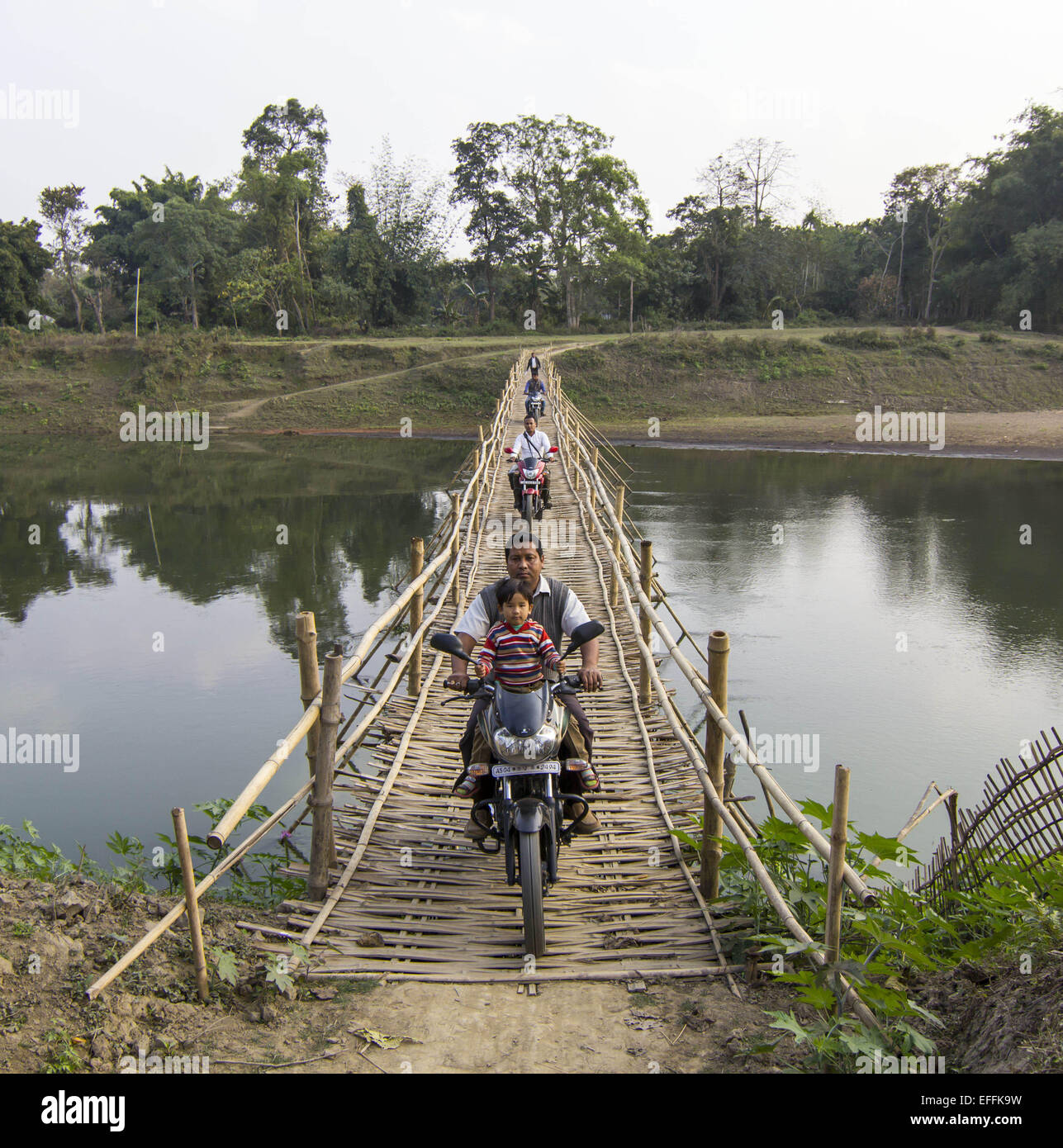 Feb. 3, 2015 - Sivasagar, Assam, India - Indian people cross a bamboo ...