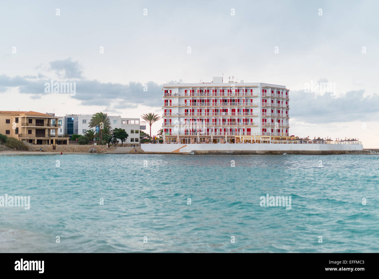 Luxury red hotel near the sea Stock Photo - Alamy