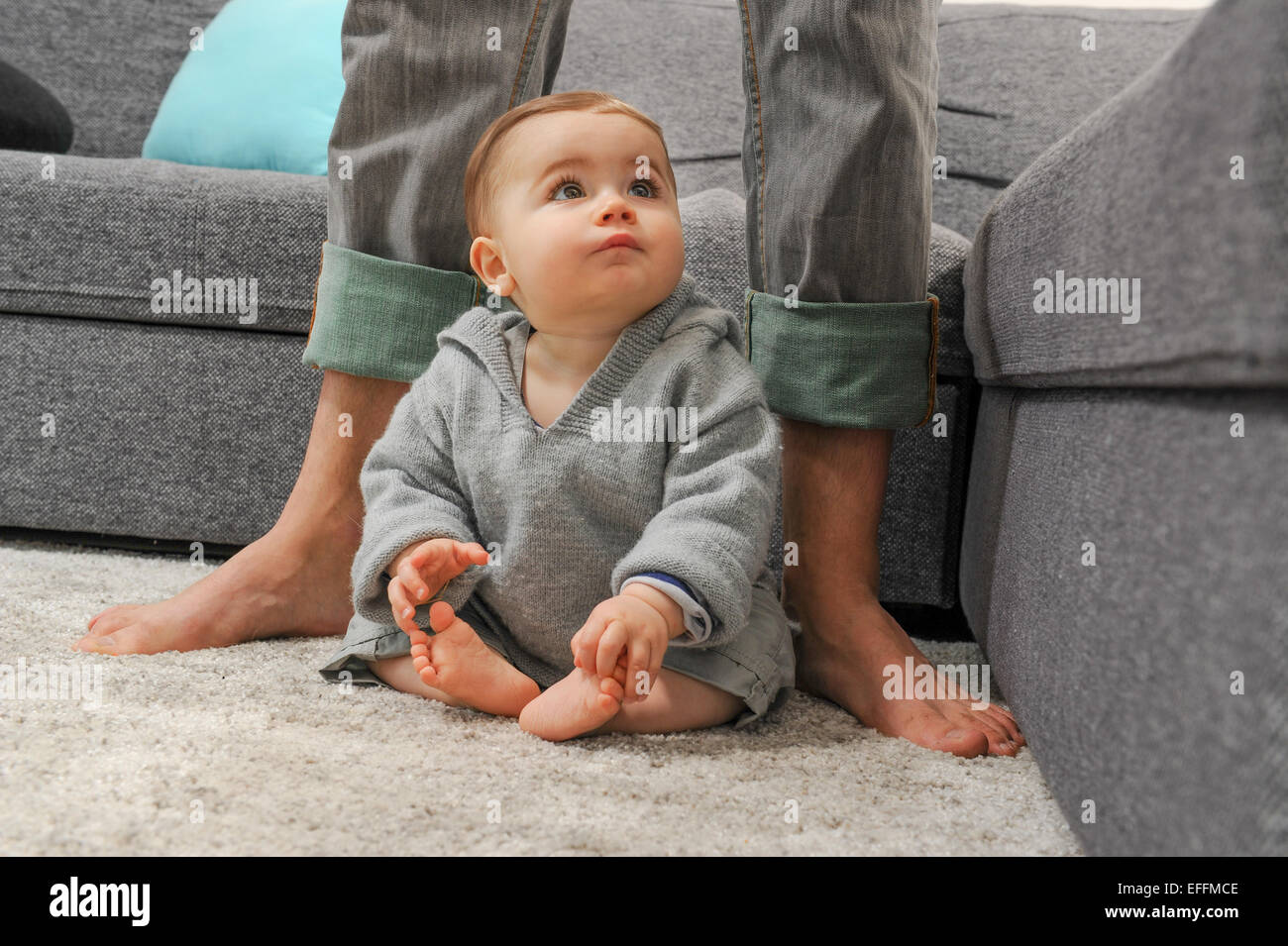 Baby sitting on dad hi-res stock photography and images - Alamy