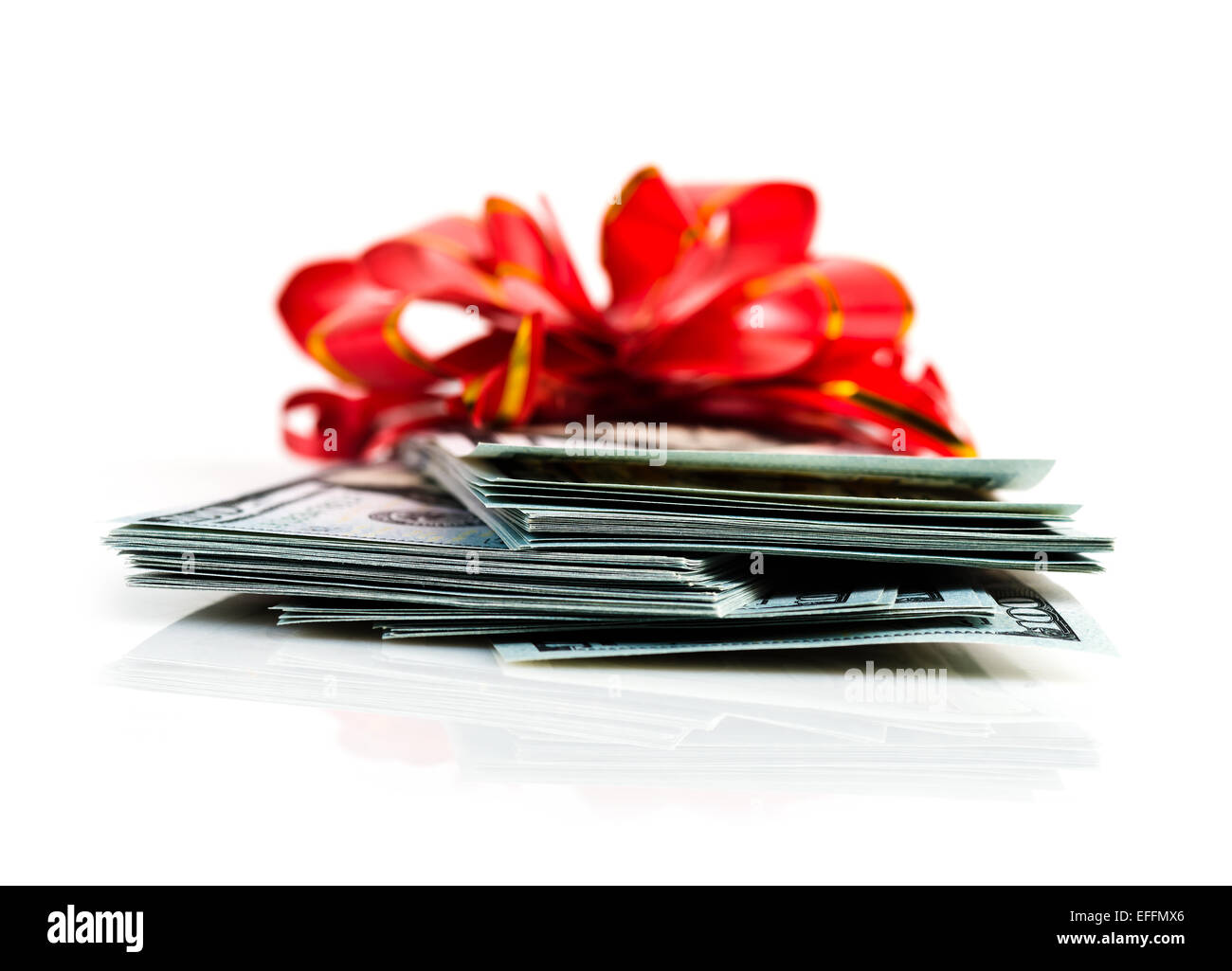 Money gift, big stack of dollars with red bow isolated on white ...