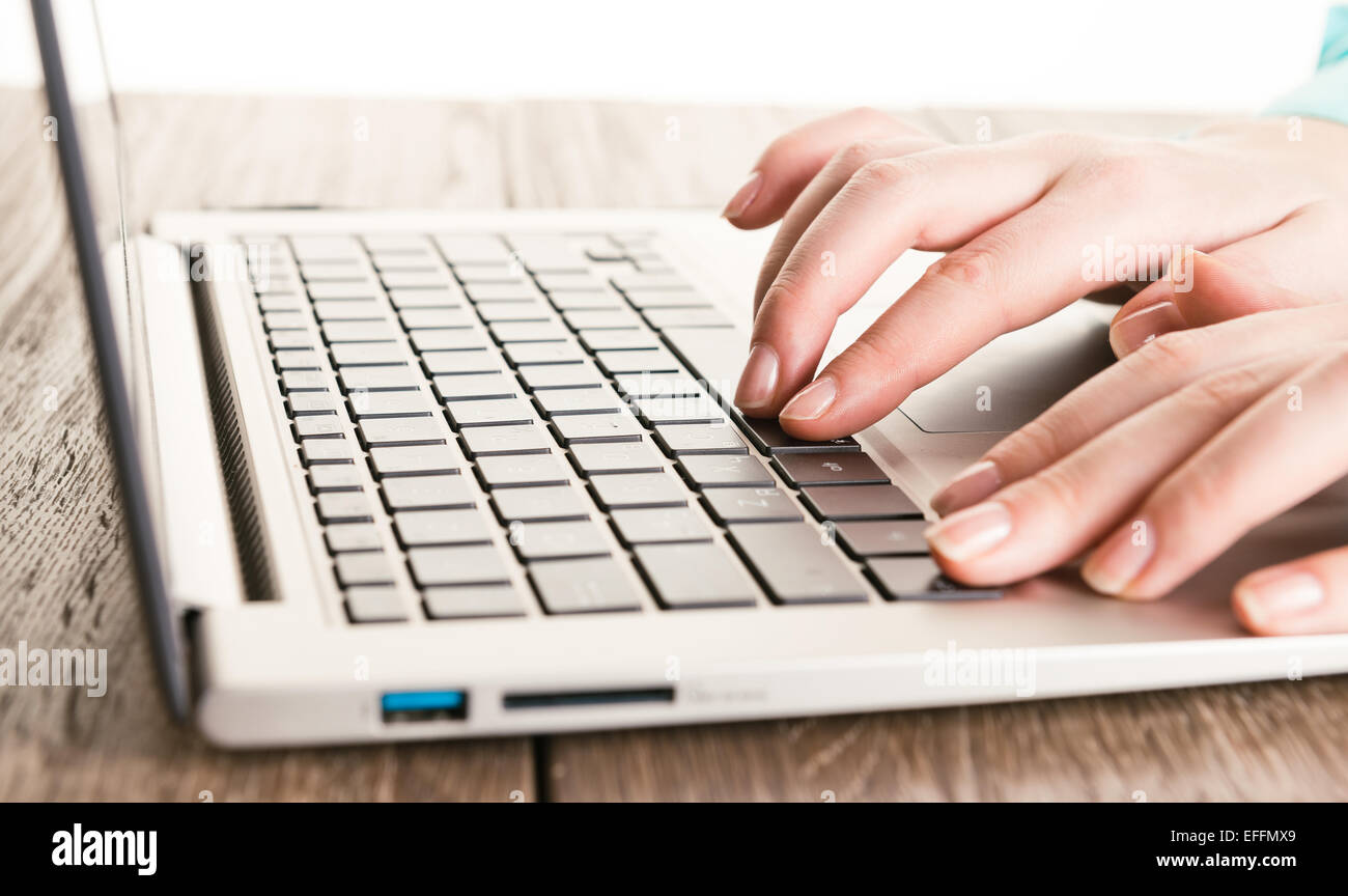 Human hands working on laptop Stock Photo - Alamy