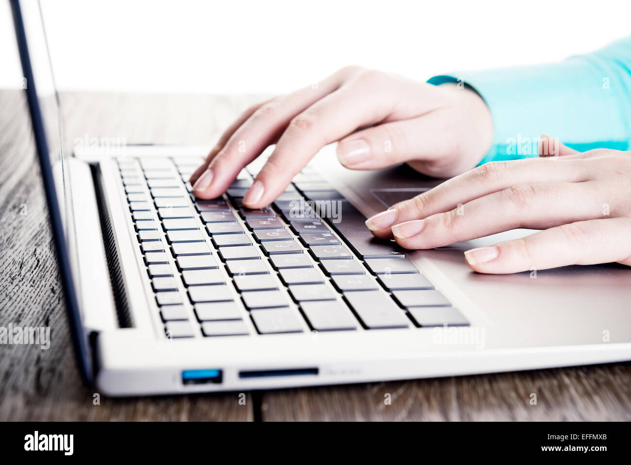Human hands working on laptop Stock Photo - Alamy
