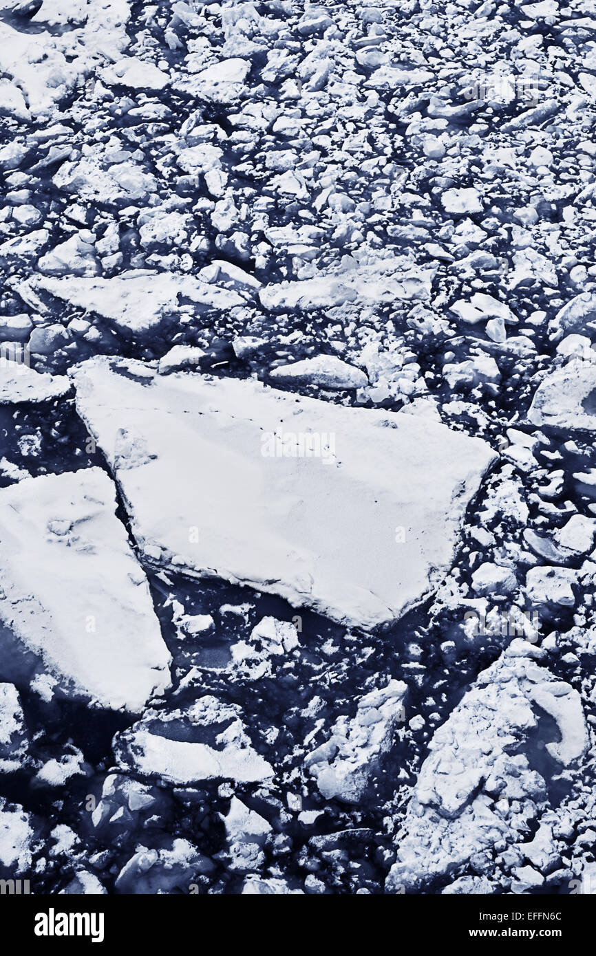 Broken ice on a river Stock Photo - Alamy