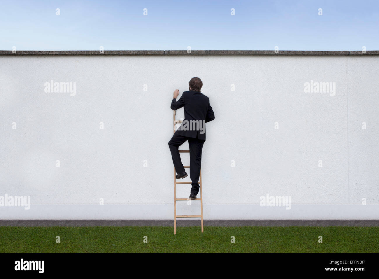 Man climbing ladder hi-res stock photography and images - Alamy