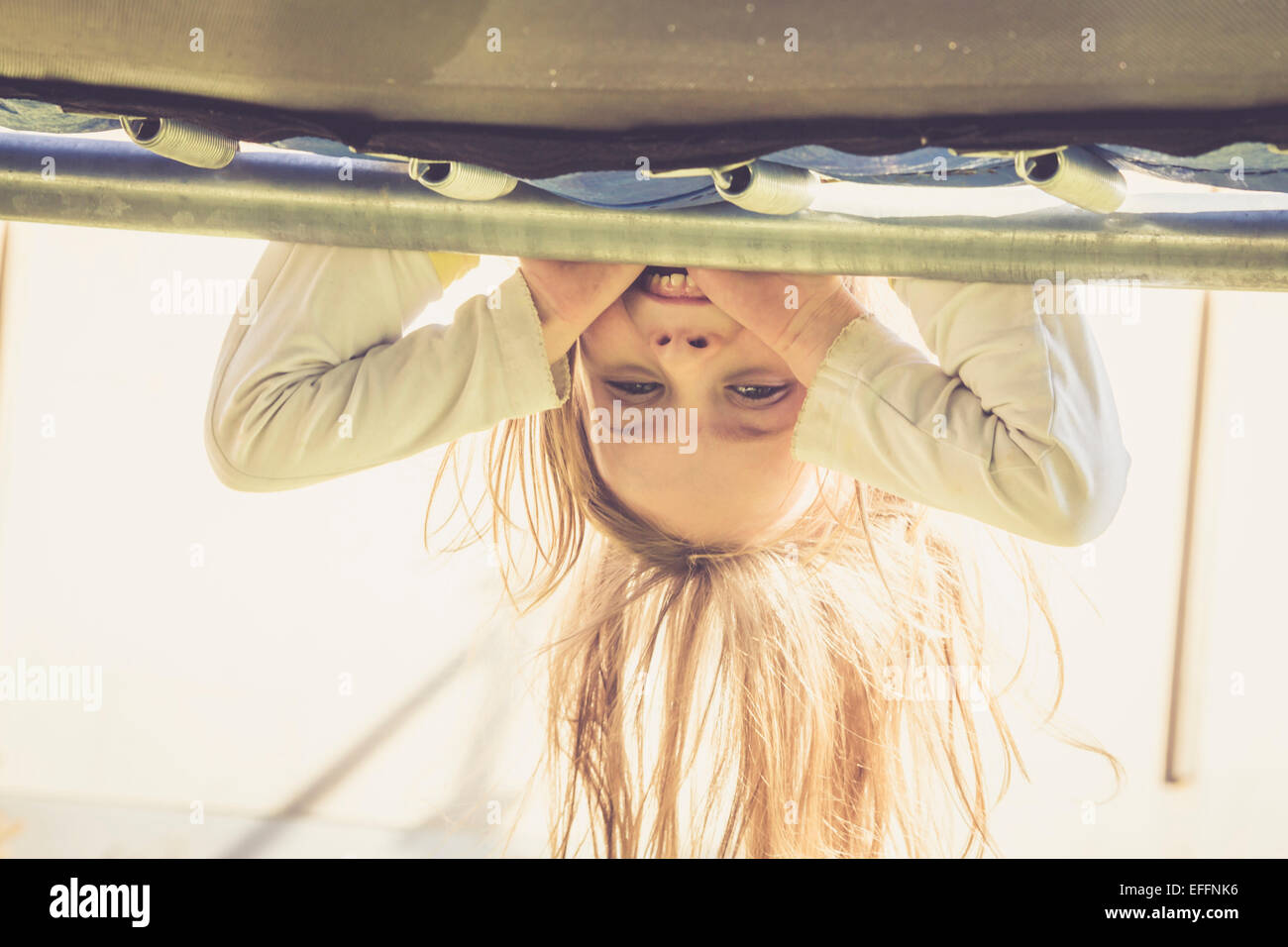 Little girl with head first Stock Photo - Alamy
