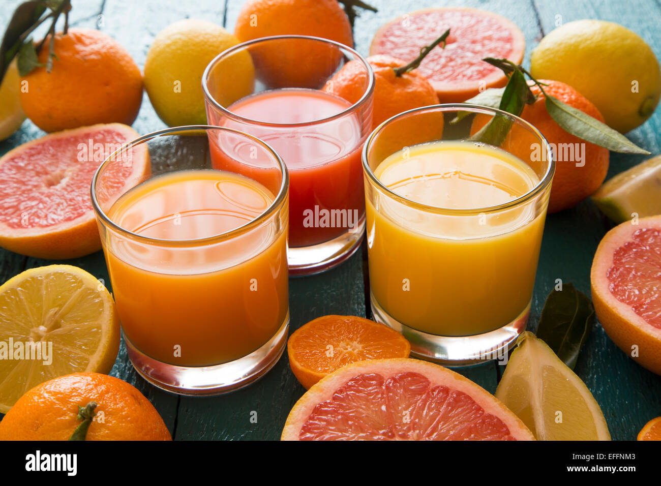 Glasses of orange juice, grapefruit juice and multivitamine juice Stock ...