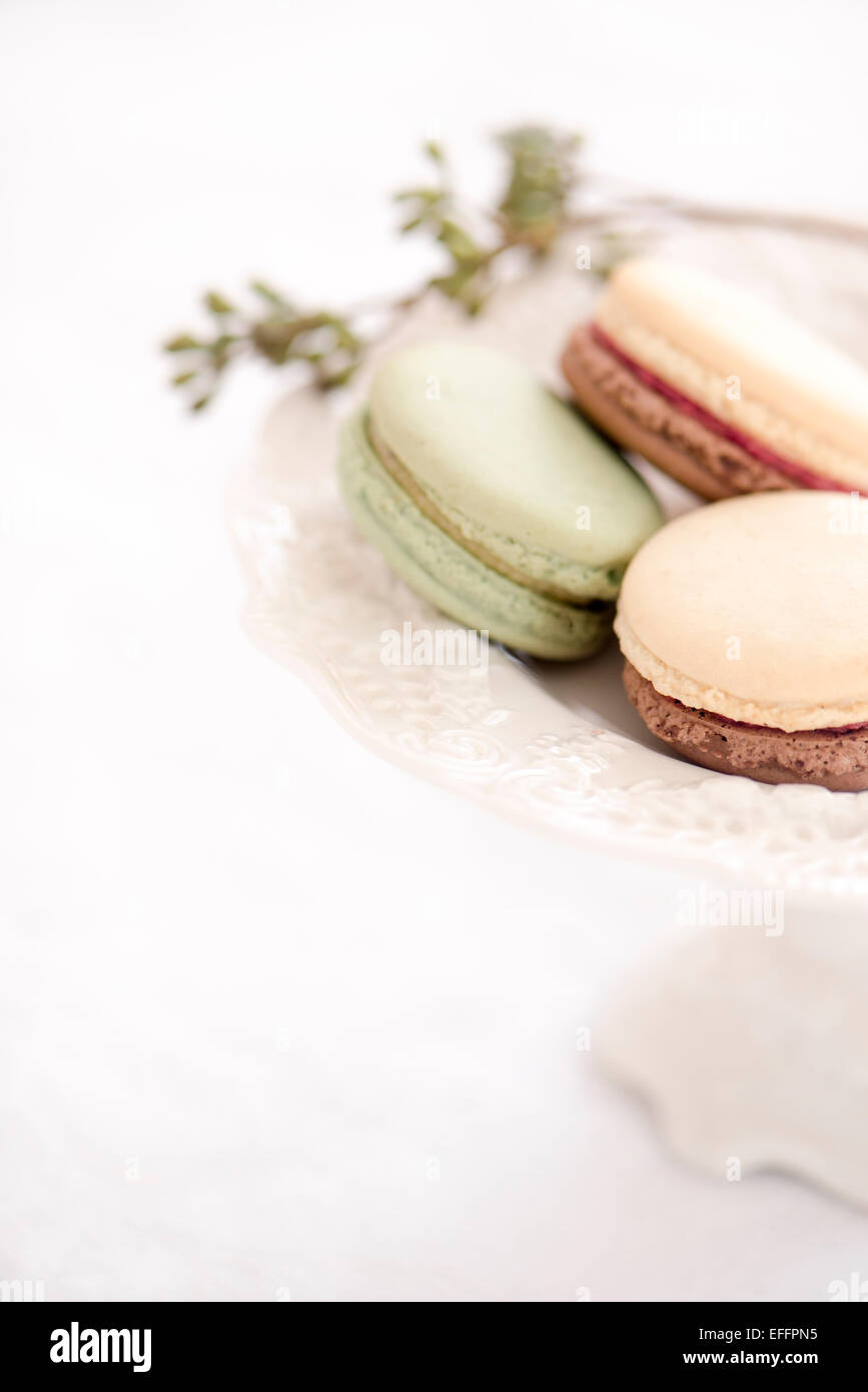 Macaroons on a pedestal plate Stock Photo - Alamy