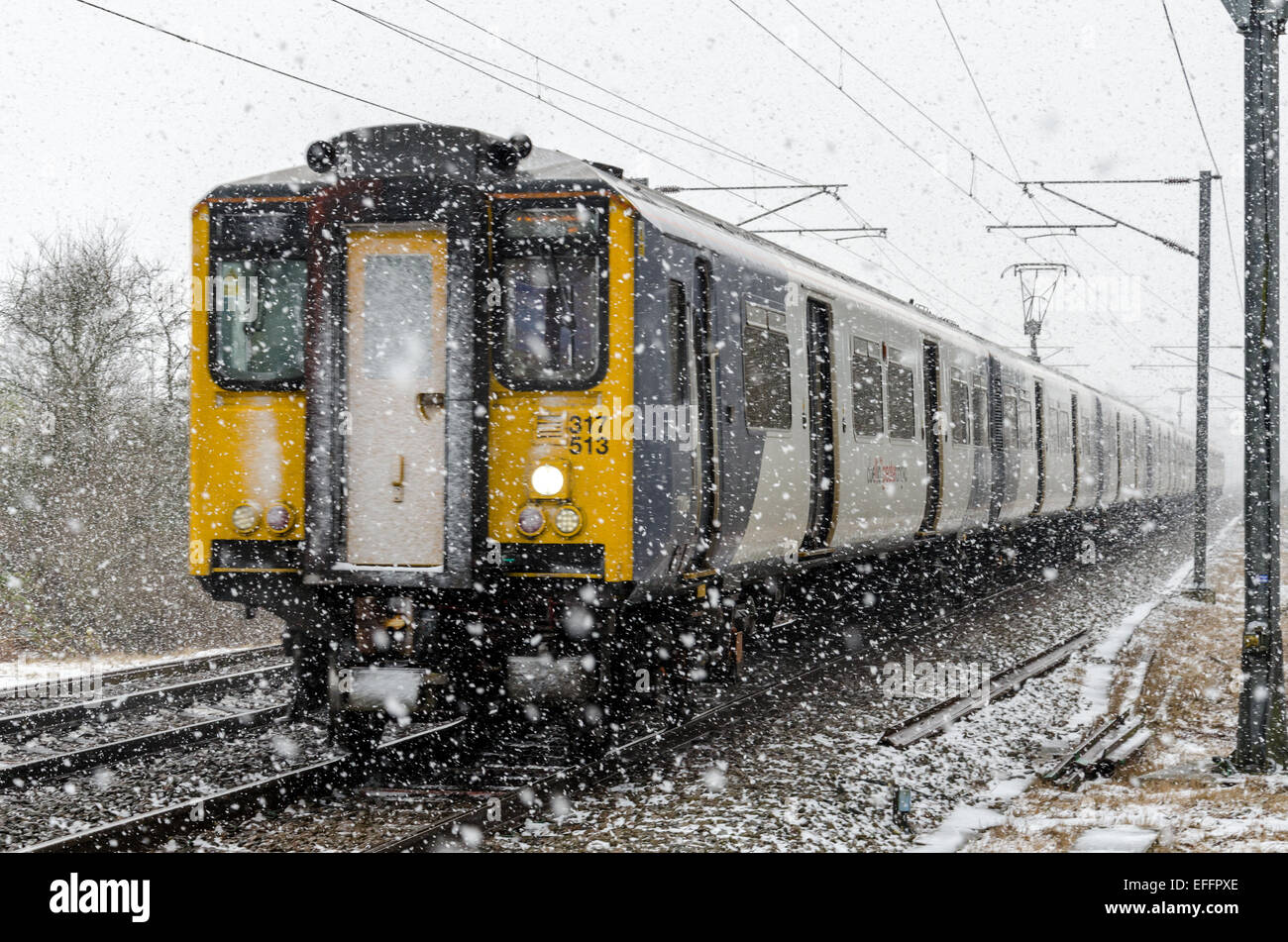 Train in snowy conditions Stock Photo - Alamy