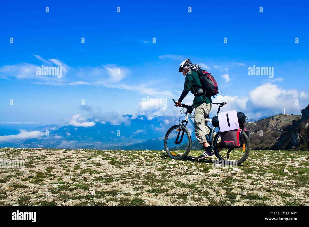 man riding a bike Stock Photo - Alamy