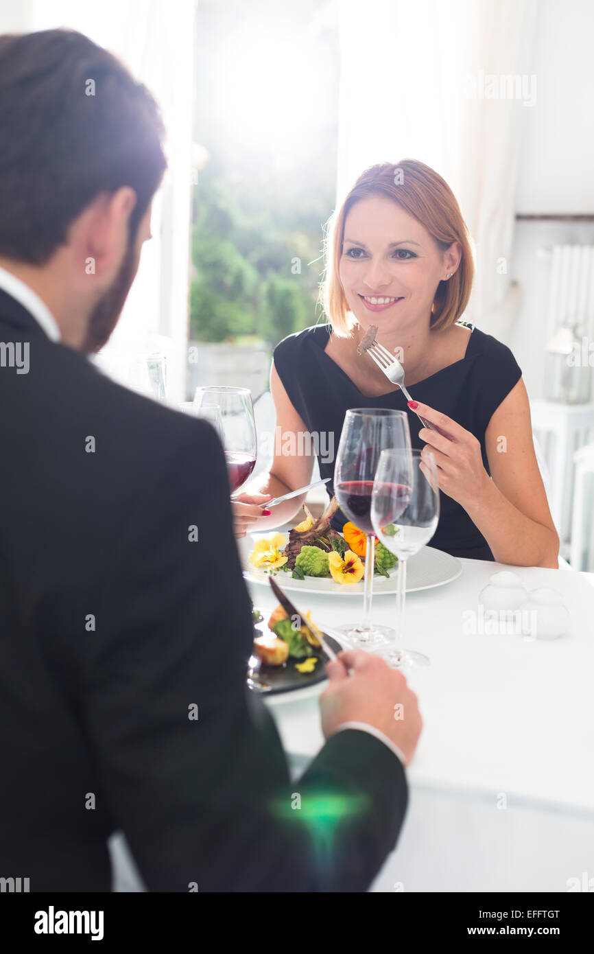 Elegant couple having dinner in restaurant Stock Photo - Alamy