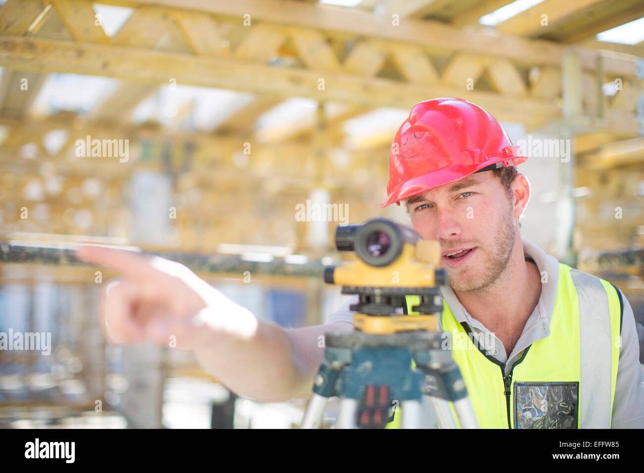 Surveyor on construction site Stock Photo - Alamy