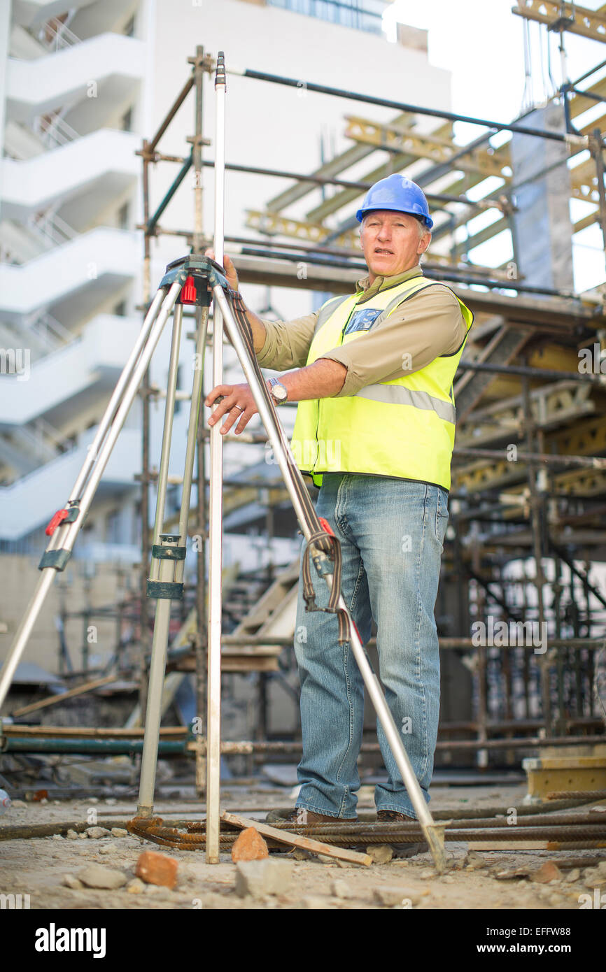 Surveyor on construction site Stock Photo - Alamy