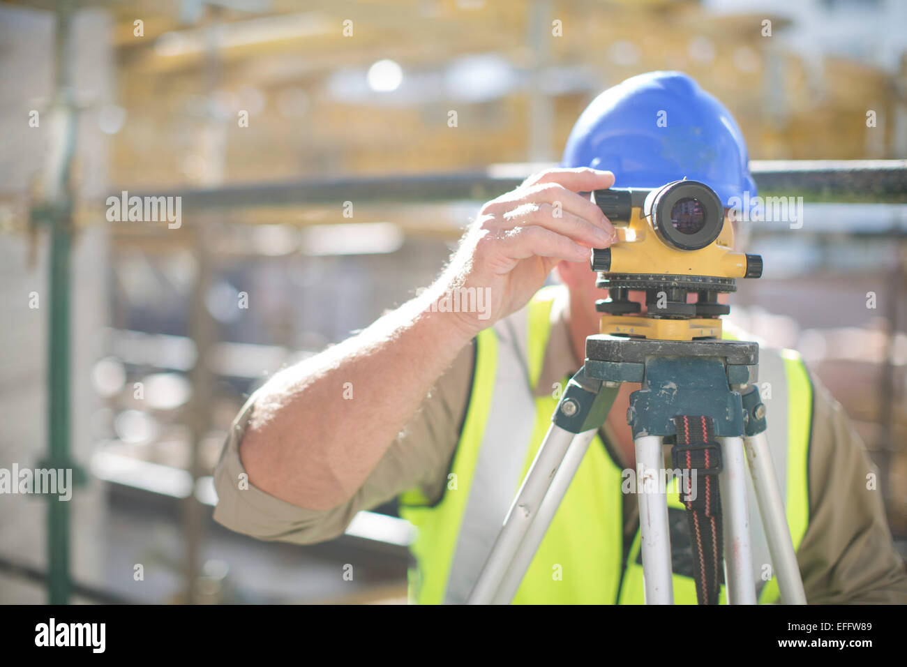 Surveyor on construction site Stock Photo - Alamy