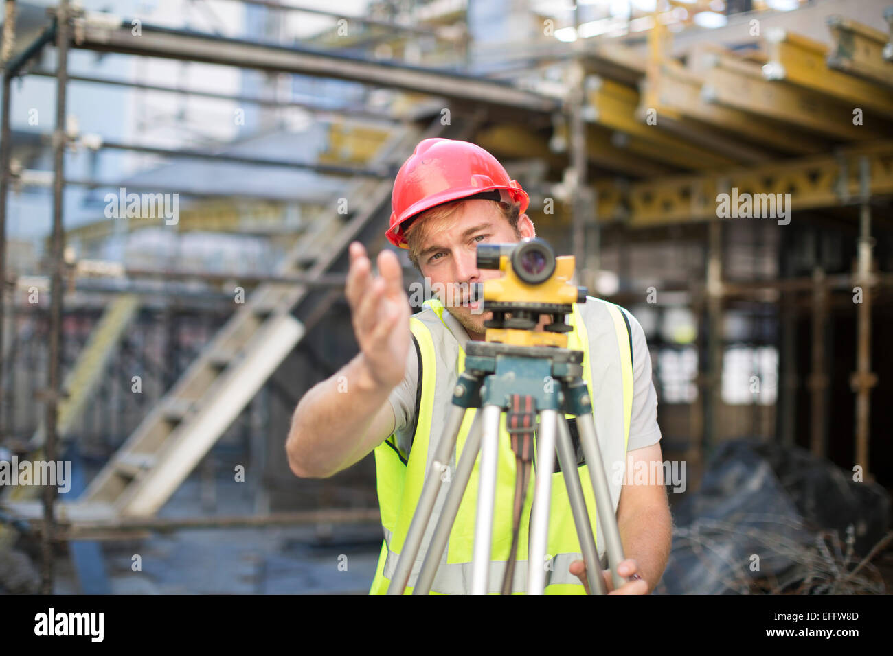 Surveyor on construction site Stock Photo - Alamy