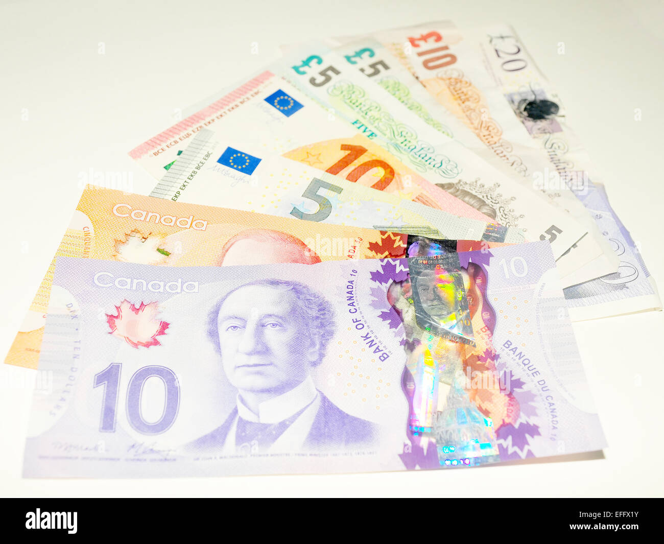 British Pound Notes Canadian Dollar Notes And European Euro Notes british-pound-notes-canadian-dollar-notes-and-european-euro-notes