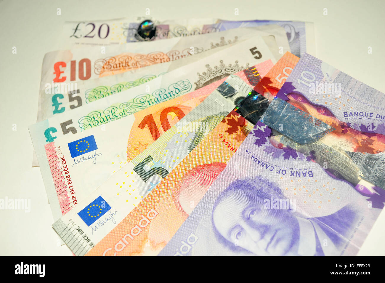British Pound notes, Canadian Dollar notes and European Euro notes ...