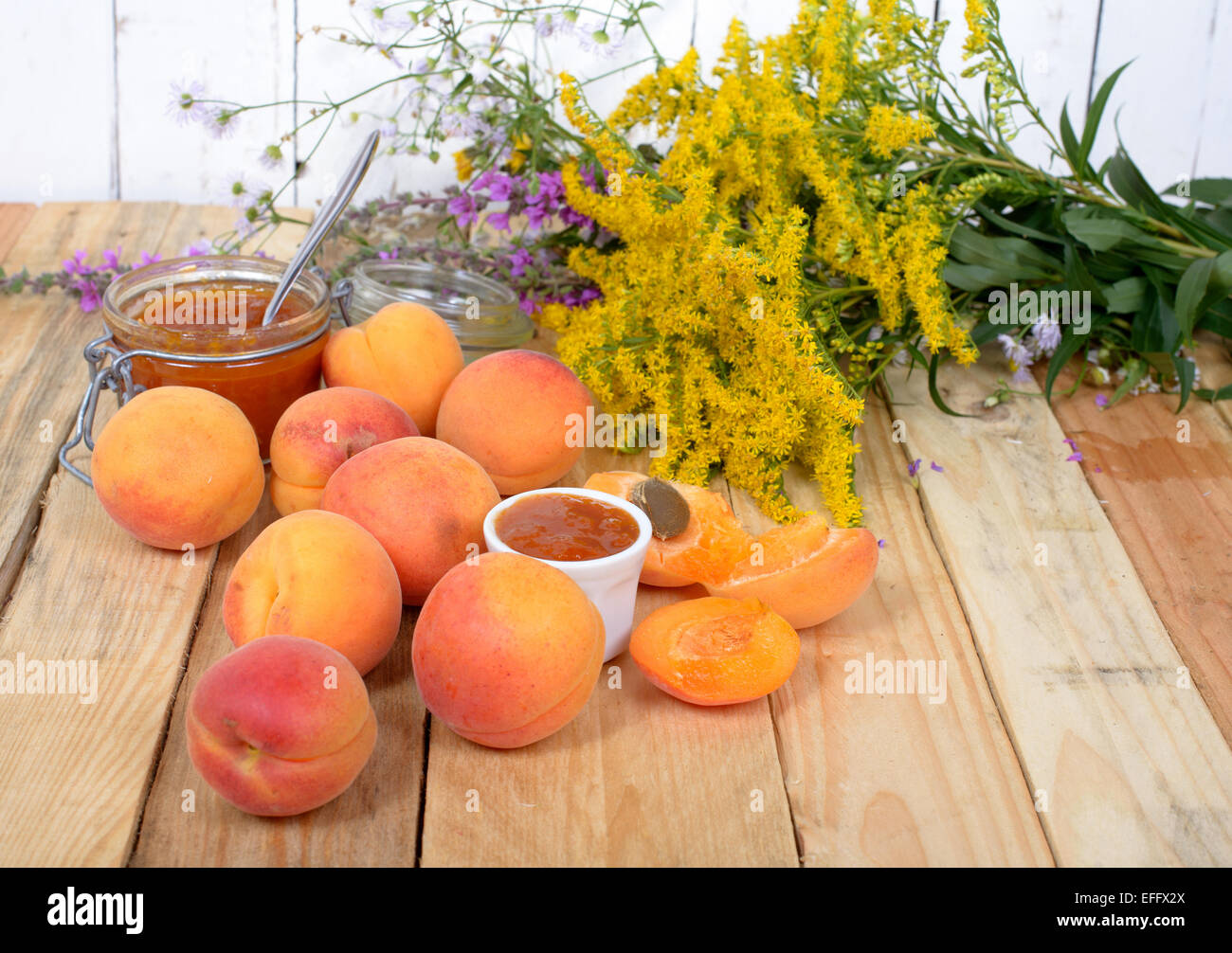 apricot jam with fruit and yellow flowers Stock Photo - Alamy