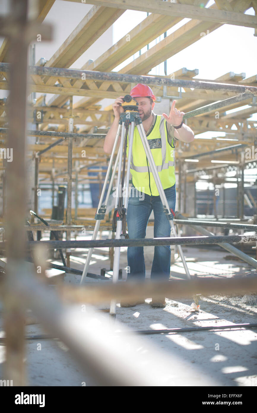 Surveyor on construction site Stock Photo - Alamy