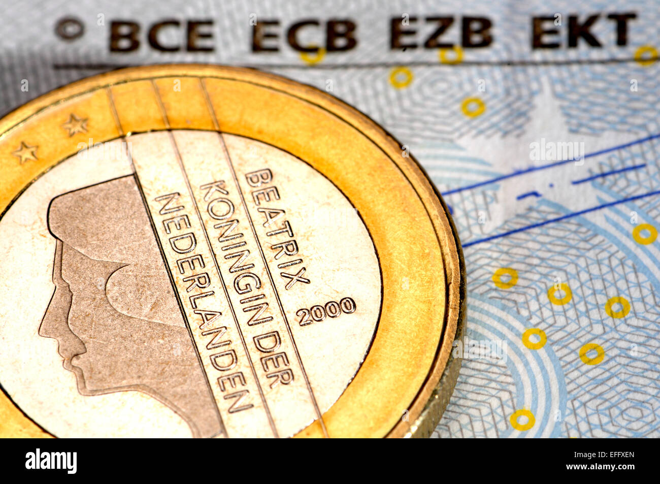 Netherlands Euro coin on a €5 note Stock Photo - Alamy