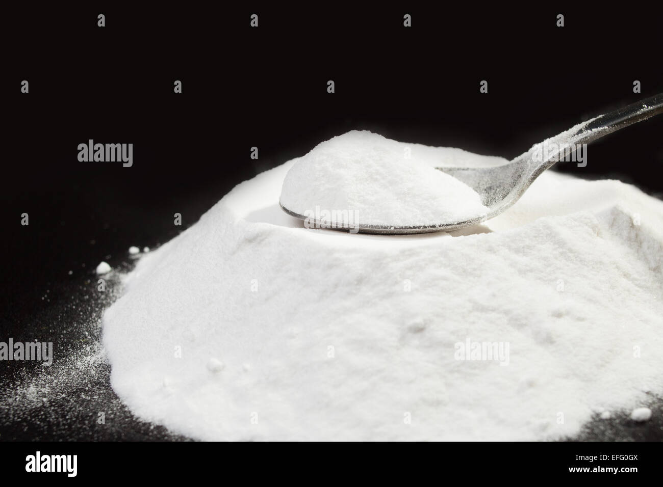 white powder on a spoon Stock Photo - Alamy