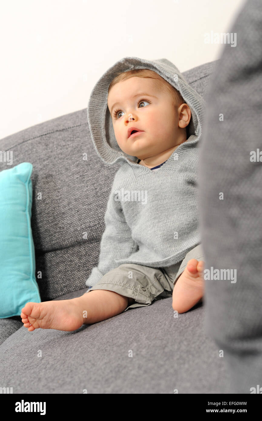 Child on sofa hi-res stock photography and images - Alamy
