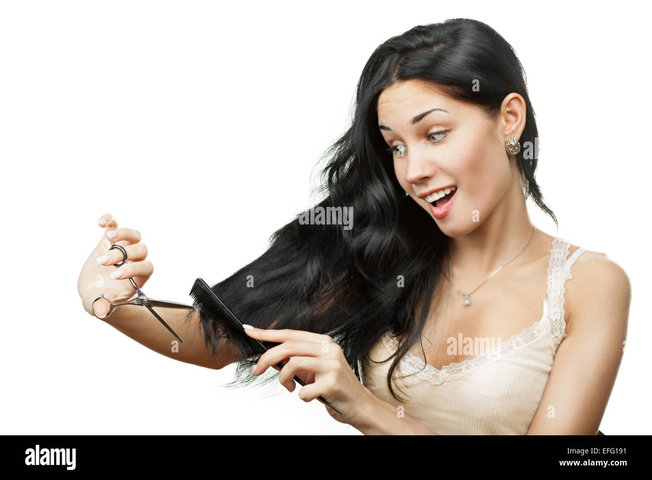Happy woman holding scissors Stock Photo - Alamy