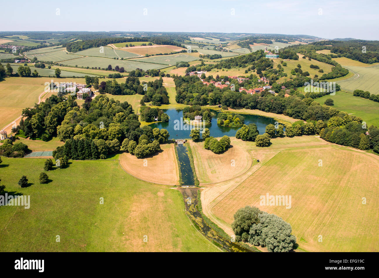 Aerial view of West Wycombe Park stately home and lake in rural ...