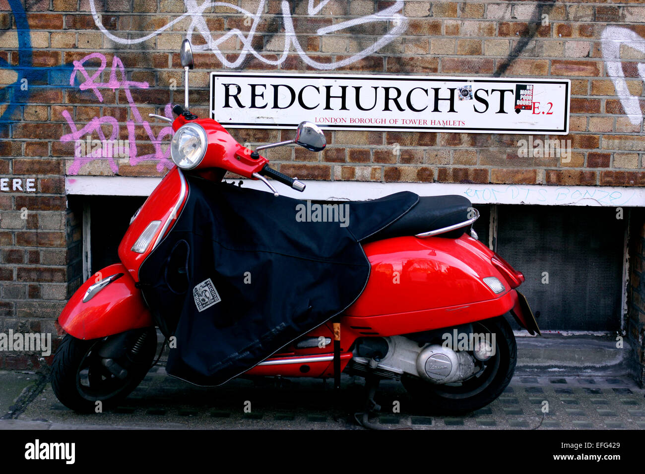 Moped parked by a wall on Redchurch Street in East London Stock Photo ...