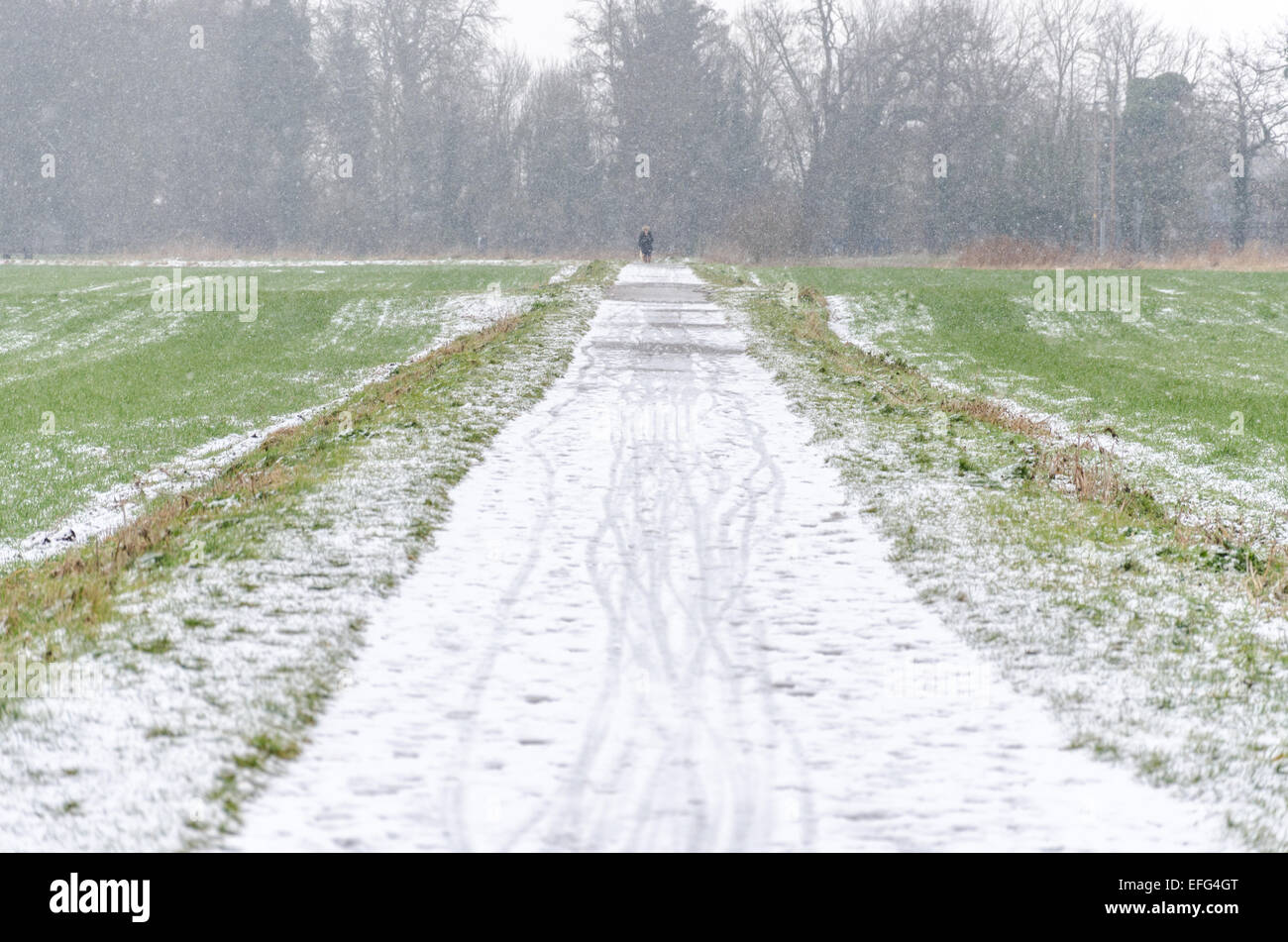 Snow on path Stock Photo - Alamy