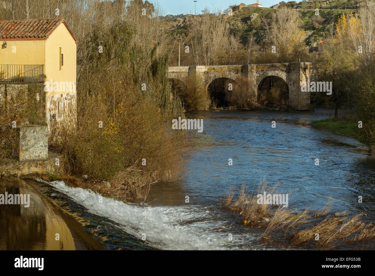 San Lazaro roman bridge that crosses the river Jerte in Plasencia ...