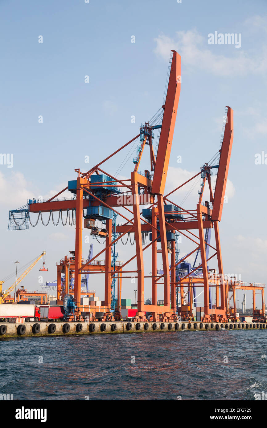 Orange Port Cranes in a Trading Port Stock Photo - Alamy