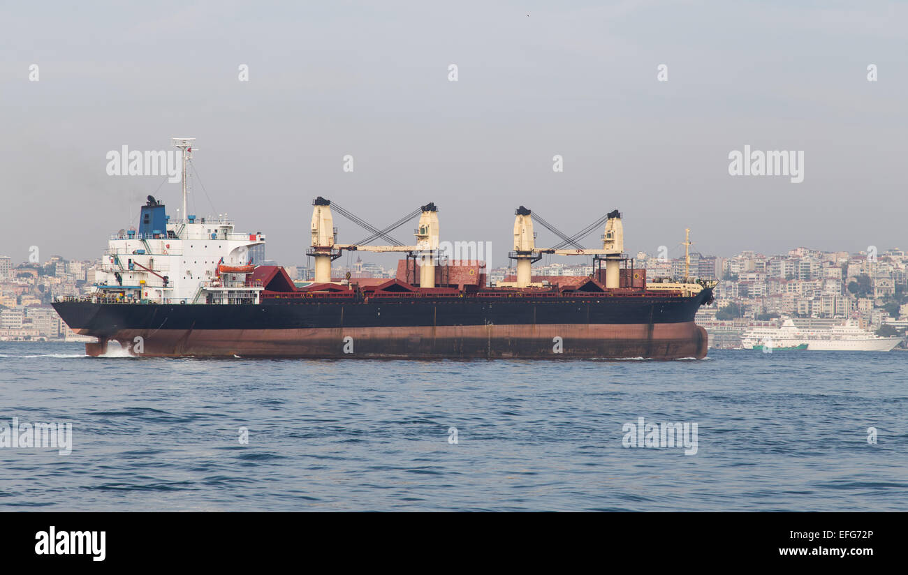 A cargo ship carrying goods between ports Stock Photo - Alamy