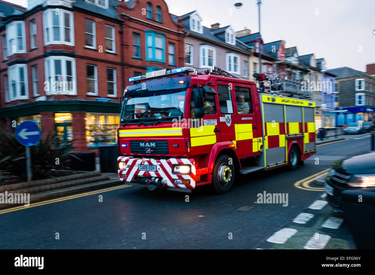 A fire engine responding to an emergency 999 call, Wales UK Stock Photo ...