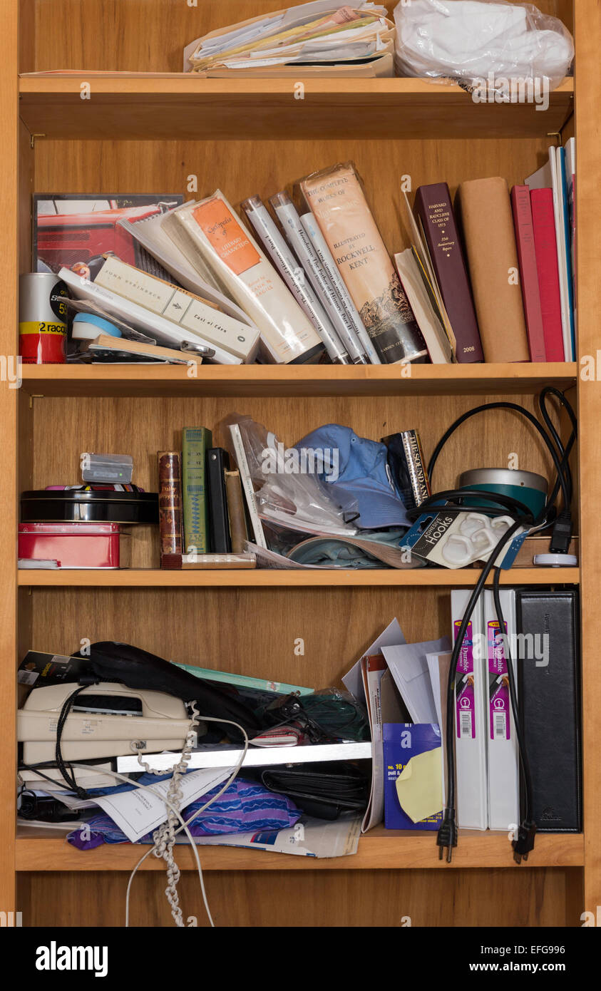 Messy shelves Stock Photo - Alamy