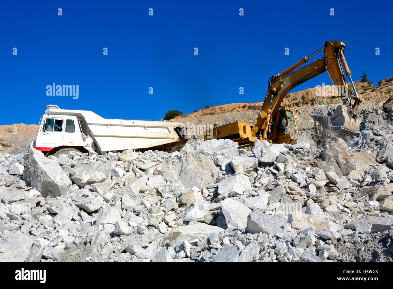 Vehicles working in quarry in hi-res stock photography and images - Alamy