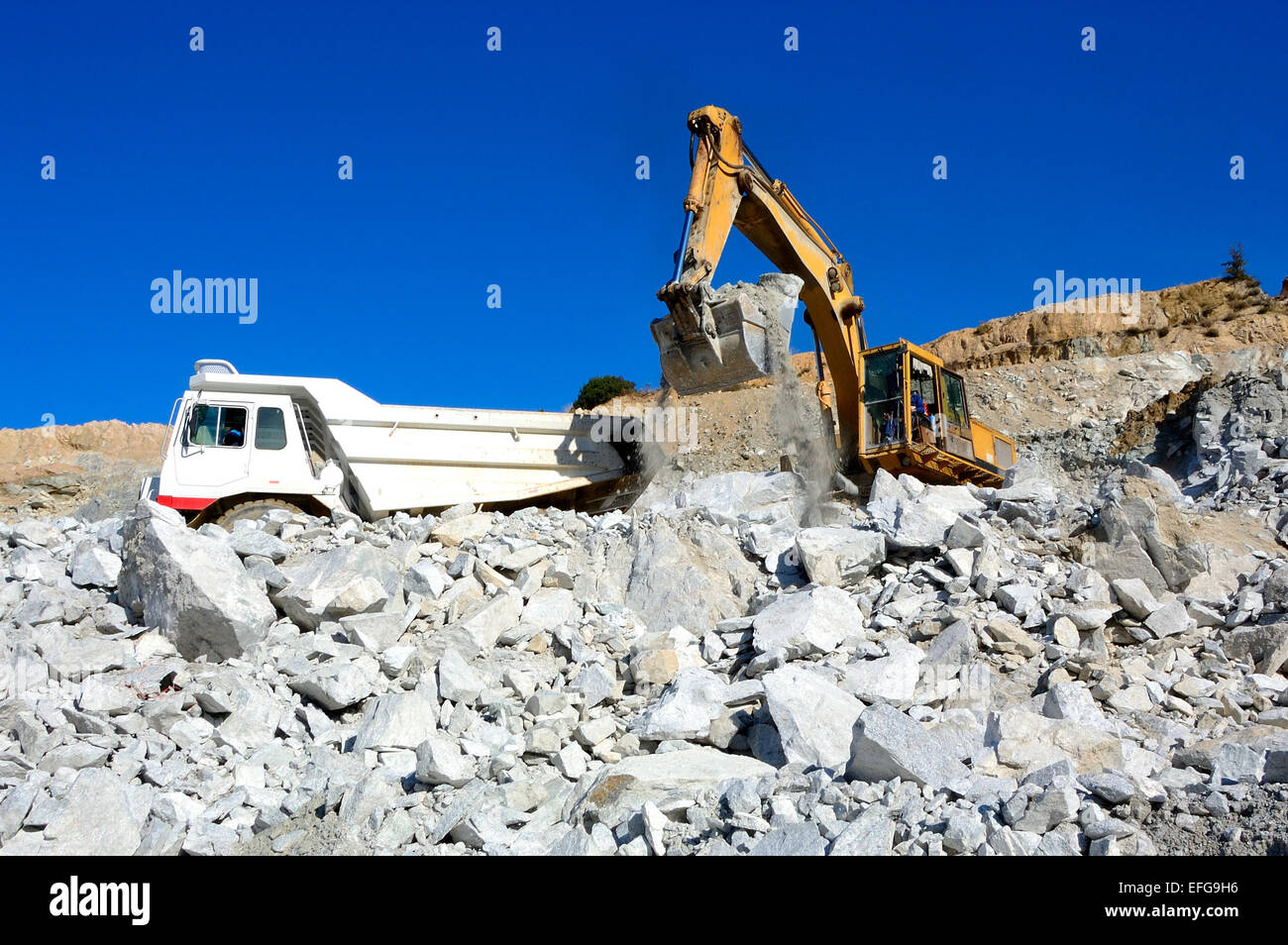 Vehicles working in quarry in hi-res stock photography and images - Alamy