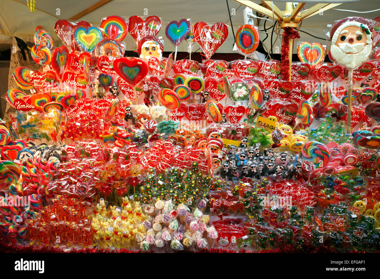 Different kinds of candy for sale at Christmas market Stock Photo - Alamy