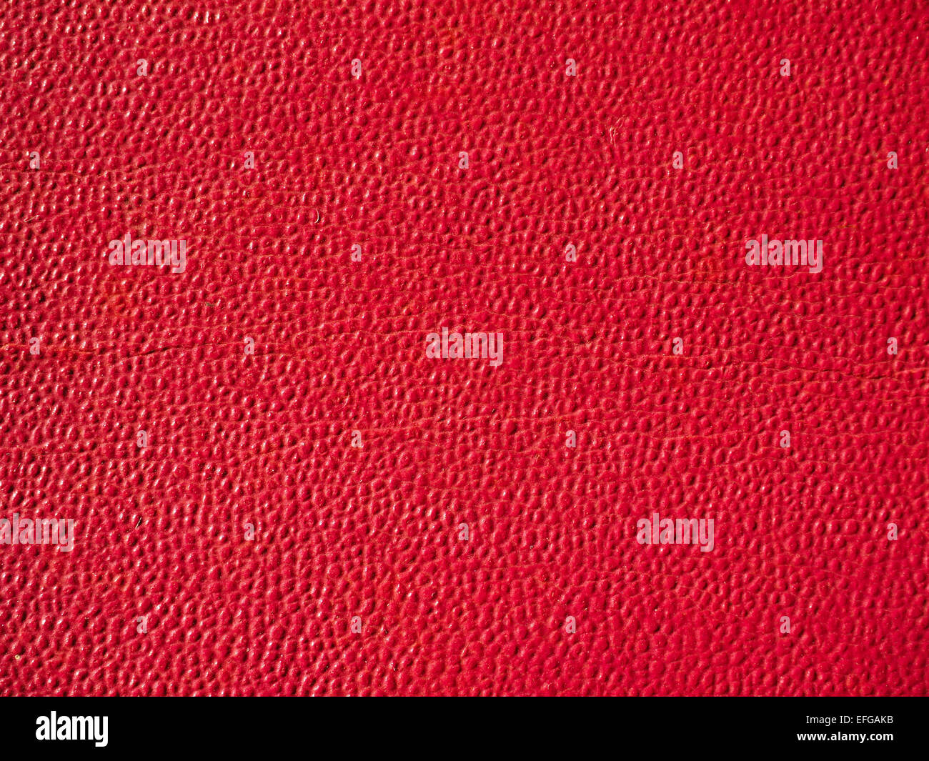 Red leatherette texture useful as a background Stock Photo - Alamy