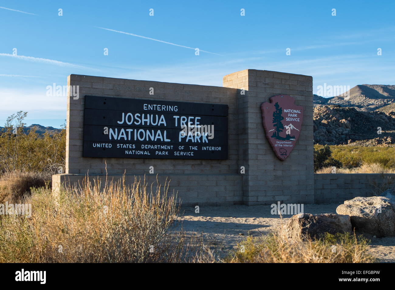 The national parks service sign at the entrance to Joshua Tree national ...