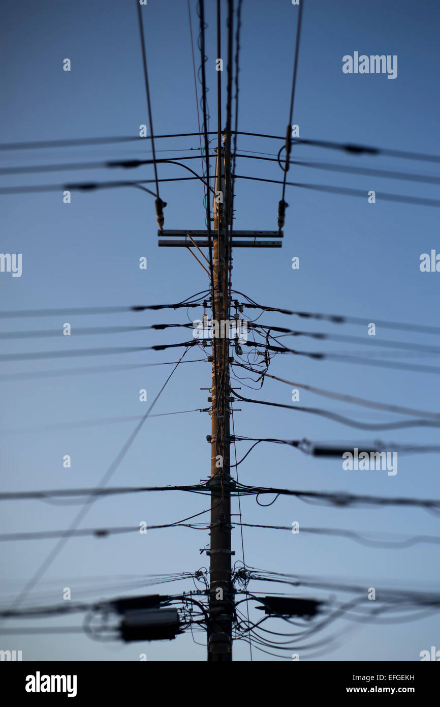 Electric pole with lots of wires and blue sky, Tokyo, Japan Stock Photo ...