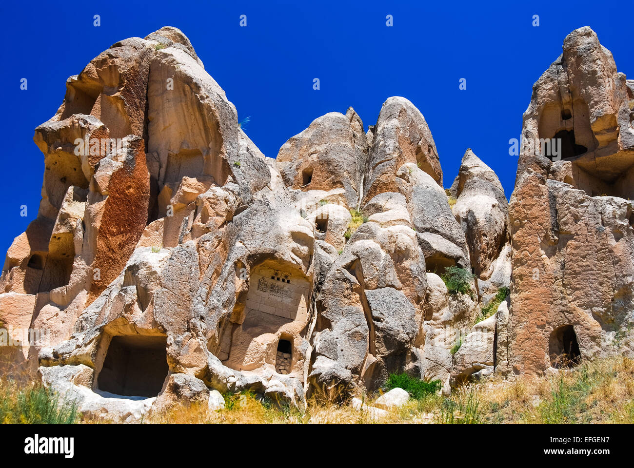 Cappadocia, Central Anatolia in Turkey. Desert landscape with ancient ...