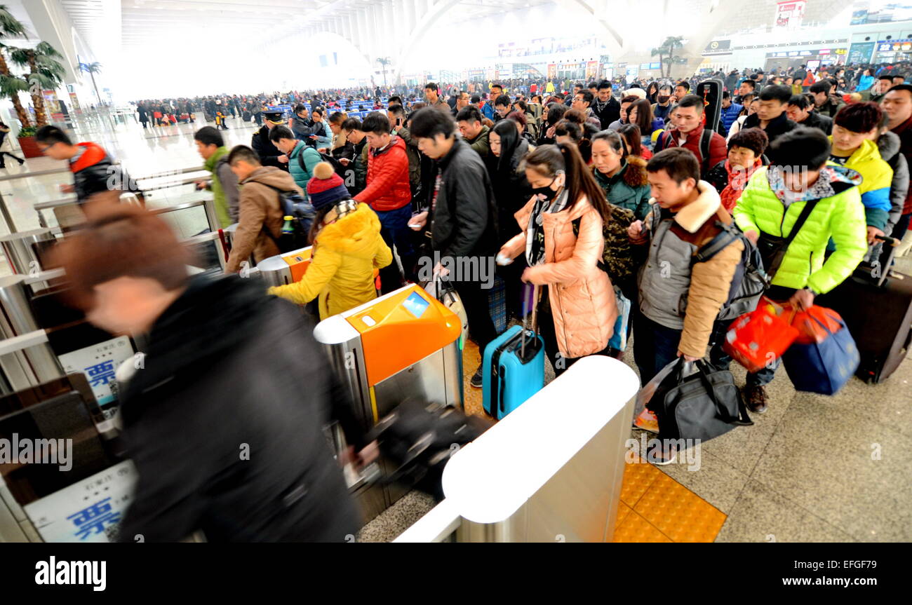 Shijiazhuang, China. 4th Feb, 2015. Passengers check in at the ...