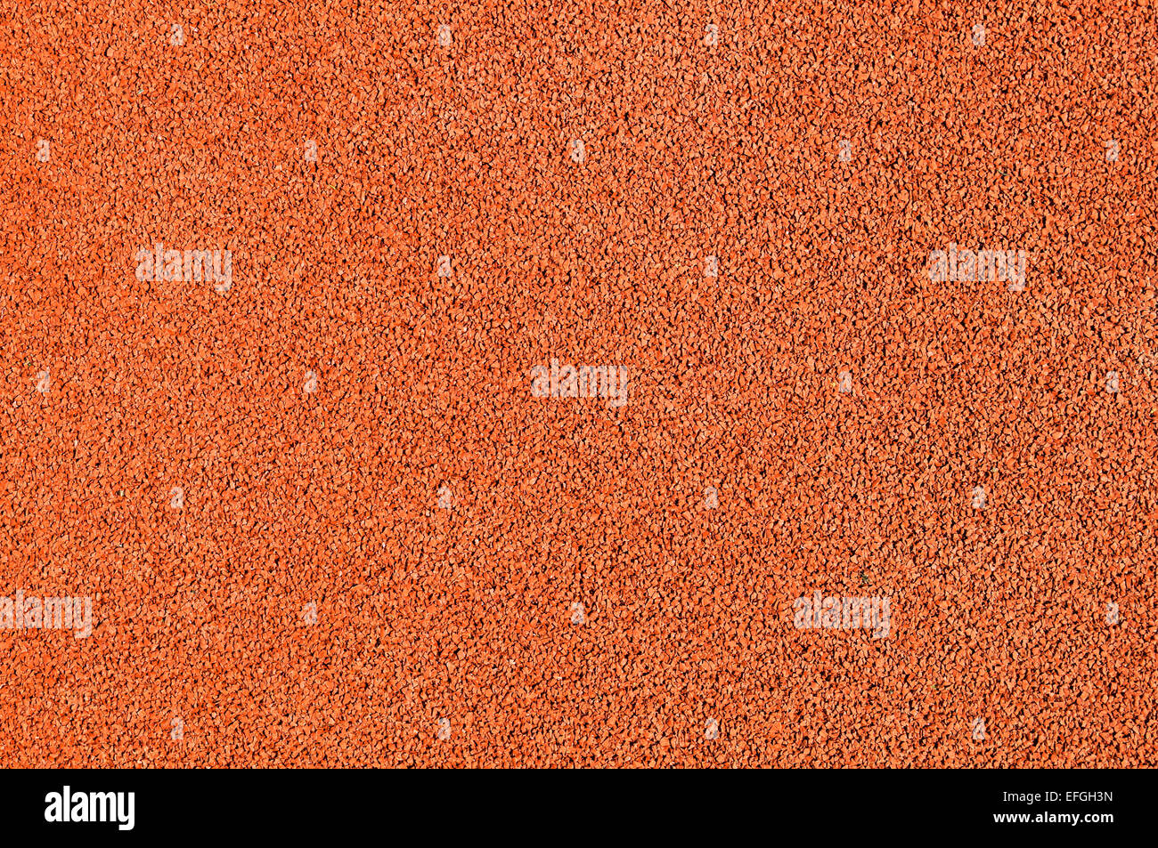 Running track surface close-up Stock Photo - Alamy